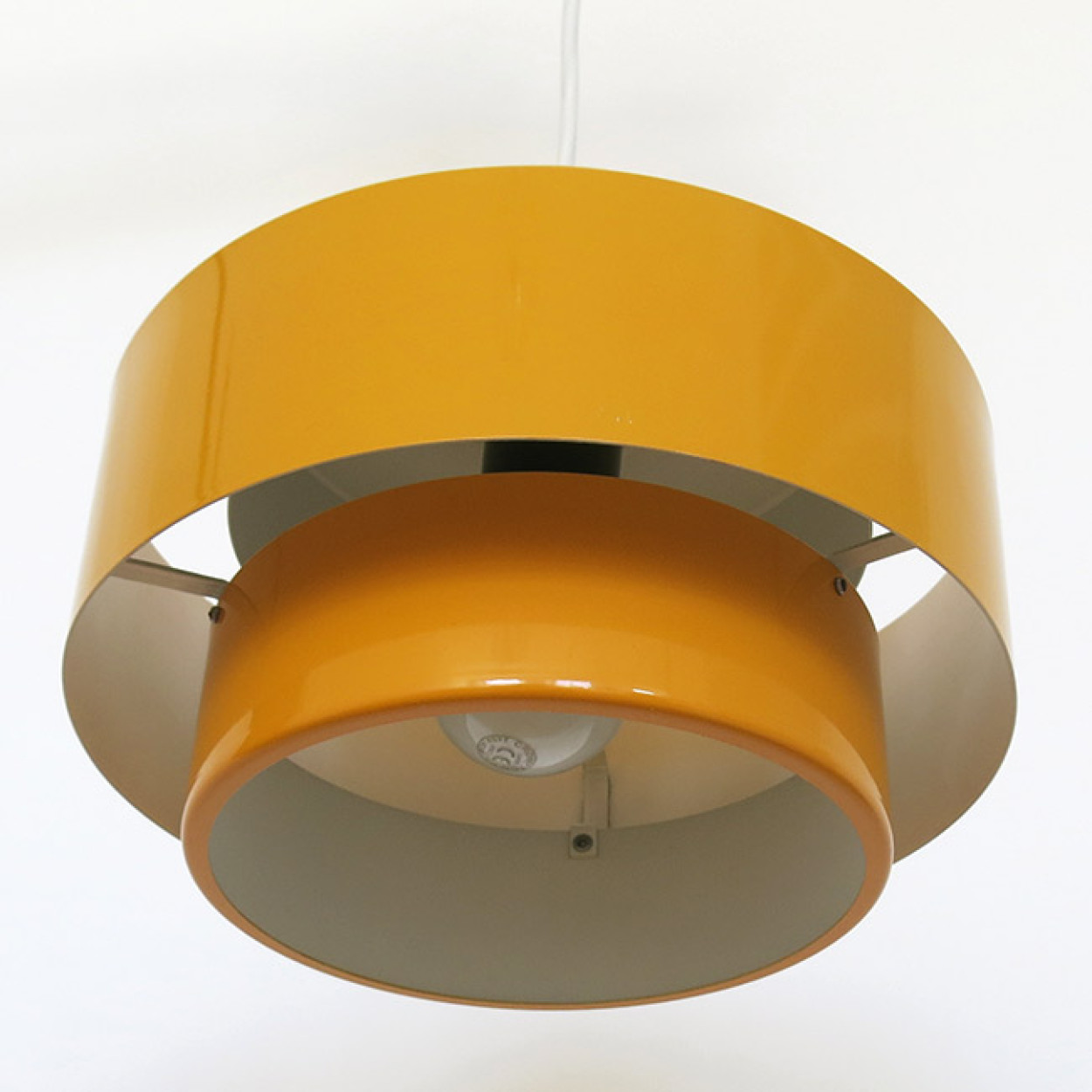 A yellow Rainbow Line Juno pendant light by Jo Hammerborg for Fog & Mørup